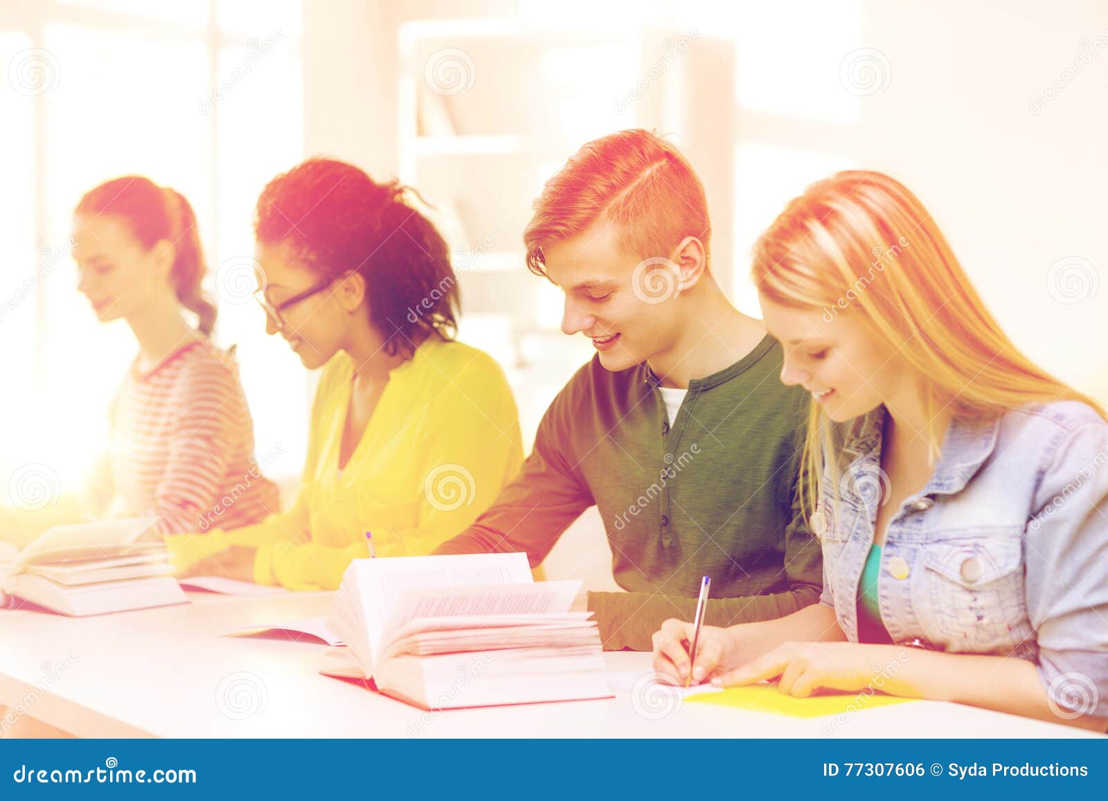 Students with Textbooks and Books at School Stock Photo - Image of ...