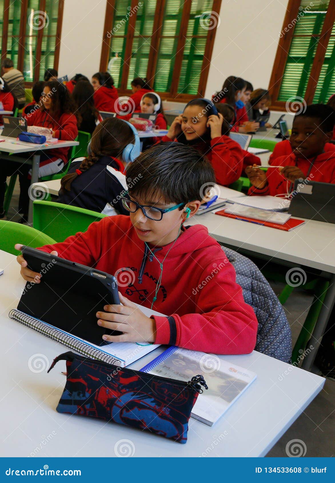 Students in Classroom Using Technology Vertical Editorial Stock Photo ...
