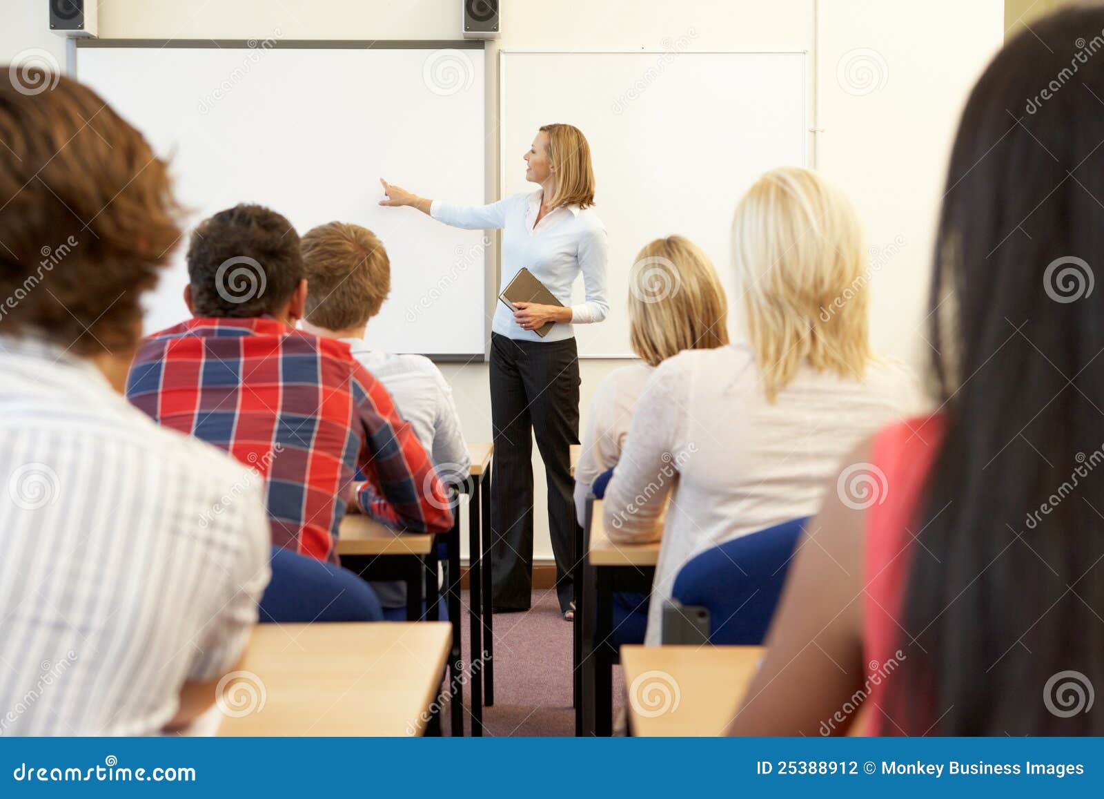Students and Tutor in Class Stock Photo - Image of attention, male ...