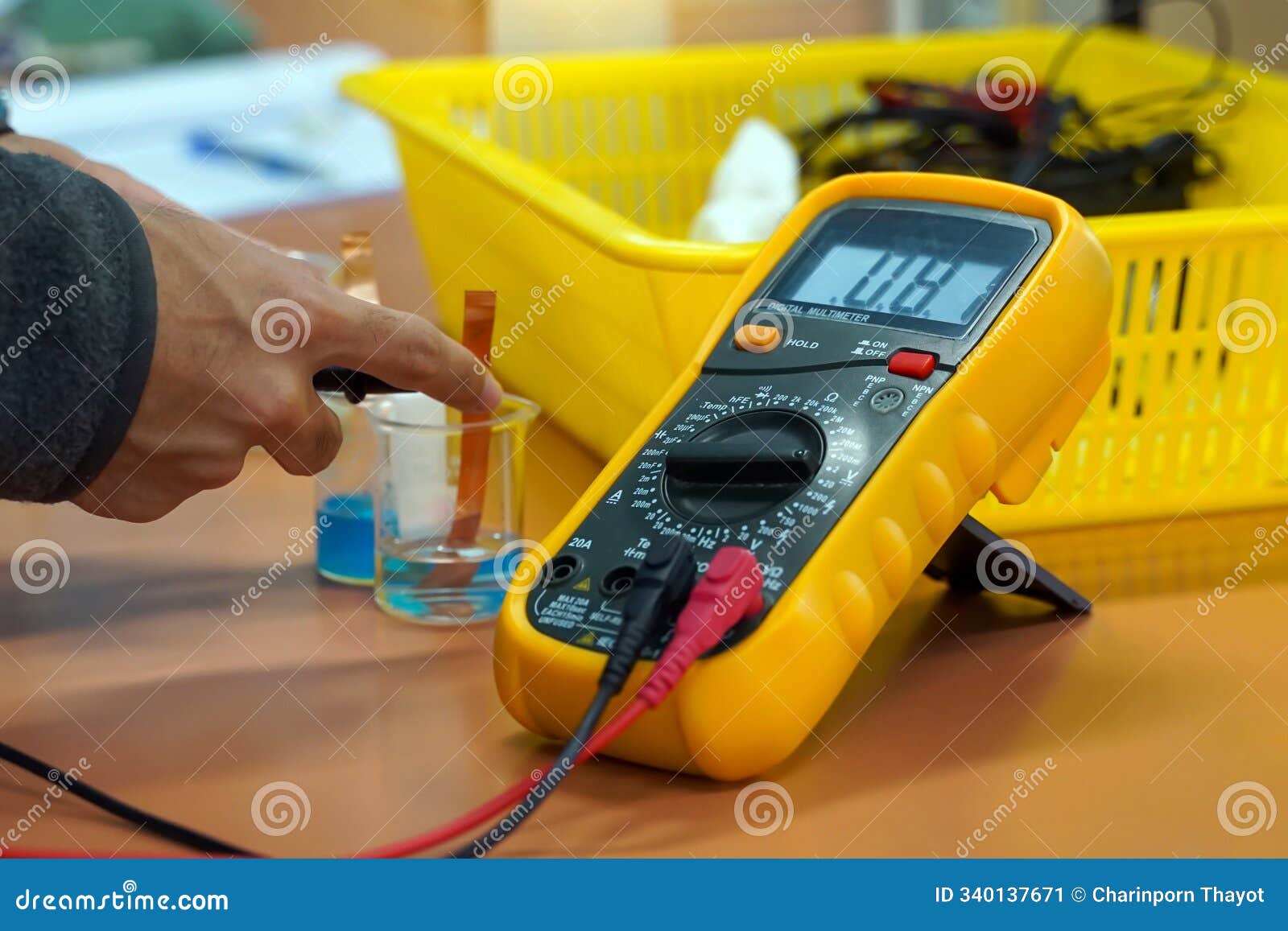 Students Use a Digital Multimeter To Measure Electrical Potential ...