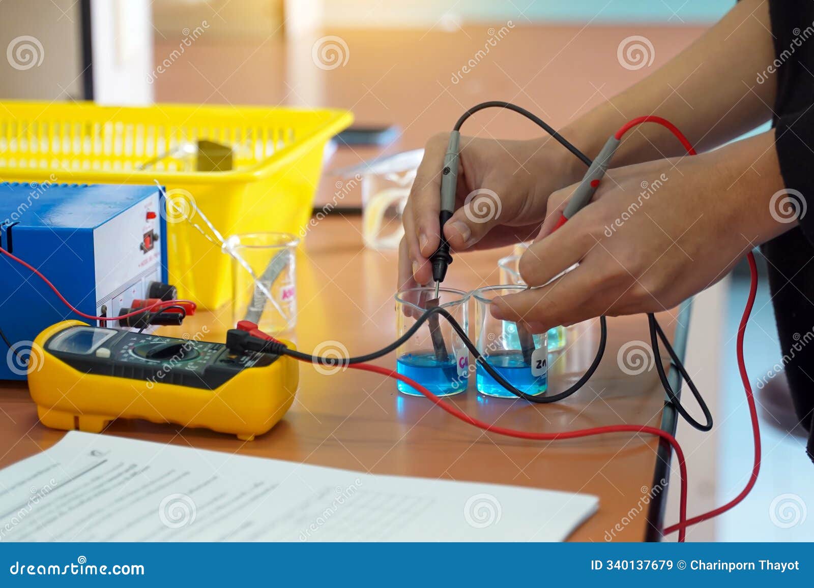 Students Use a Digital Multimeter To Measure Electrical Potential ...