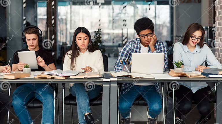 Students Using Different Gadgets Studying in Library Stock Image ...