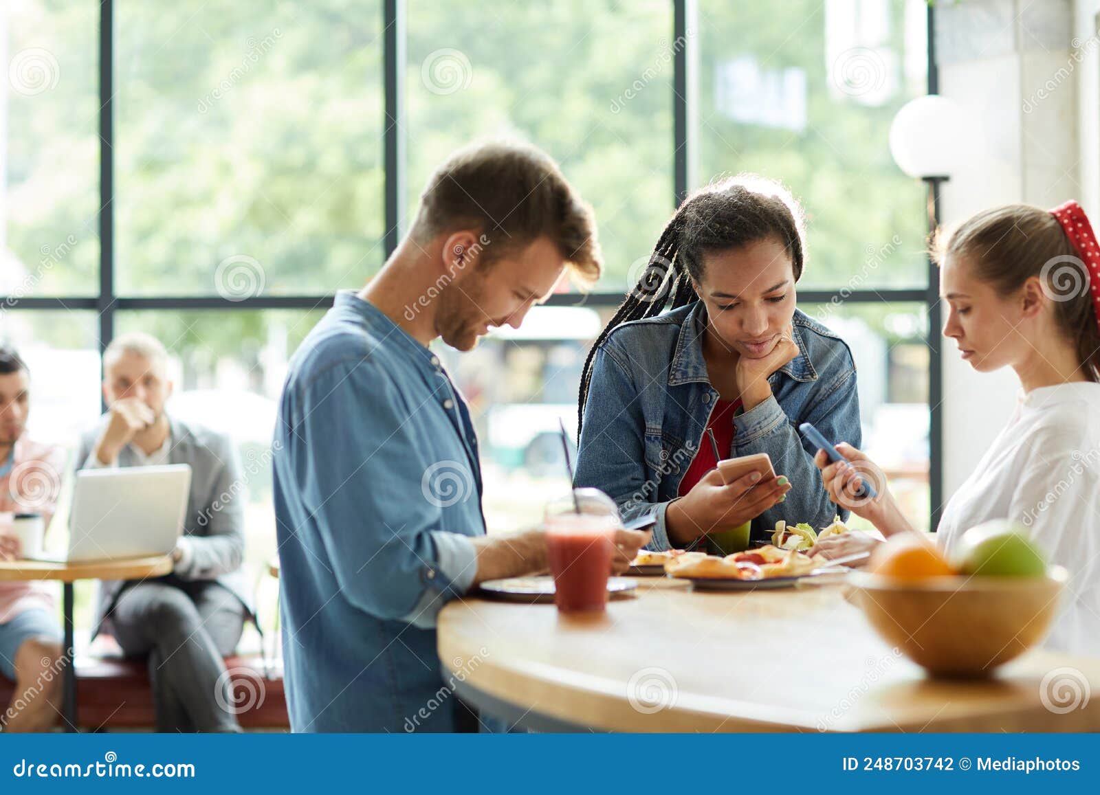 Students Using Gadgets in Cafe Stock Photo - Image of togetherness ...