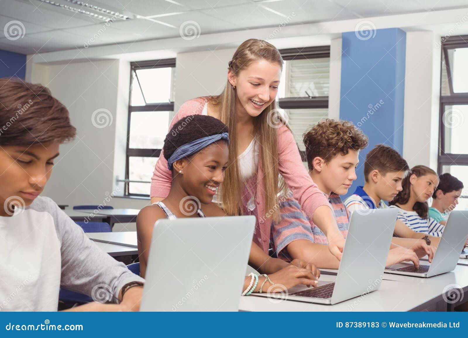 Students Using Laptop in Classroom Stock Image - Image of female ...
