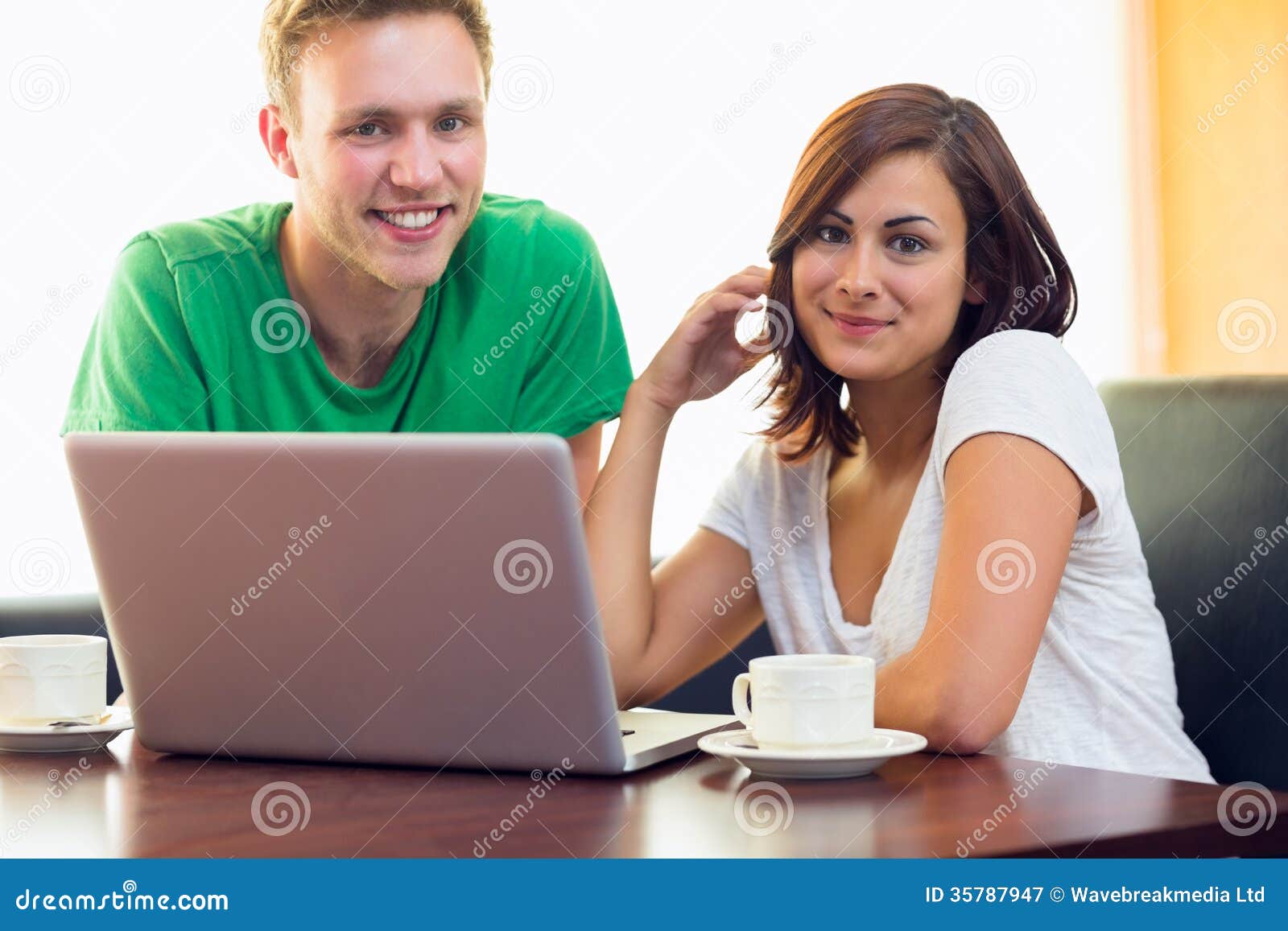 Students Using Laptop while Having Coffee at Coffee Shop Stock Image ...