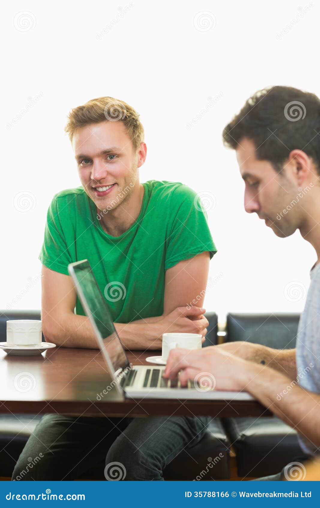 Students Using Laptop while Having Coffee at Coffee Shop Stock Photo ...