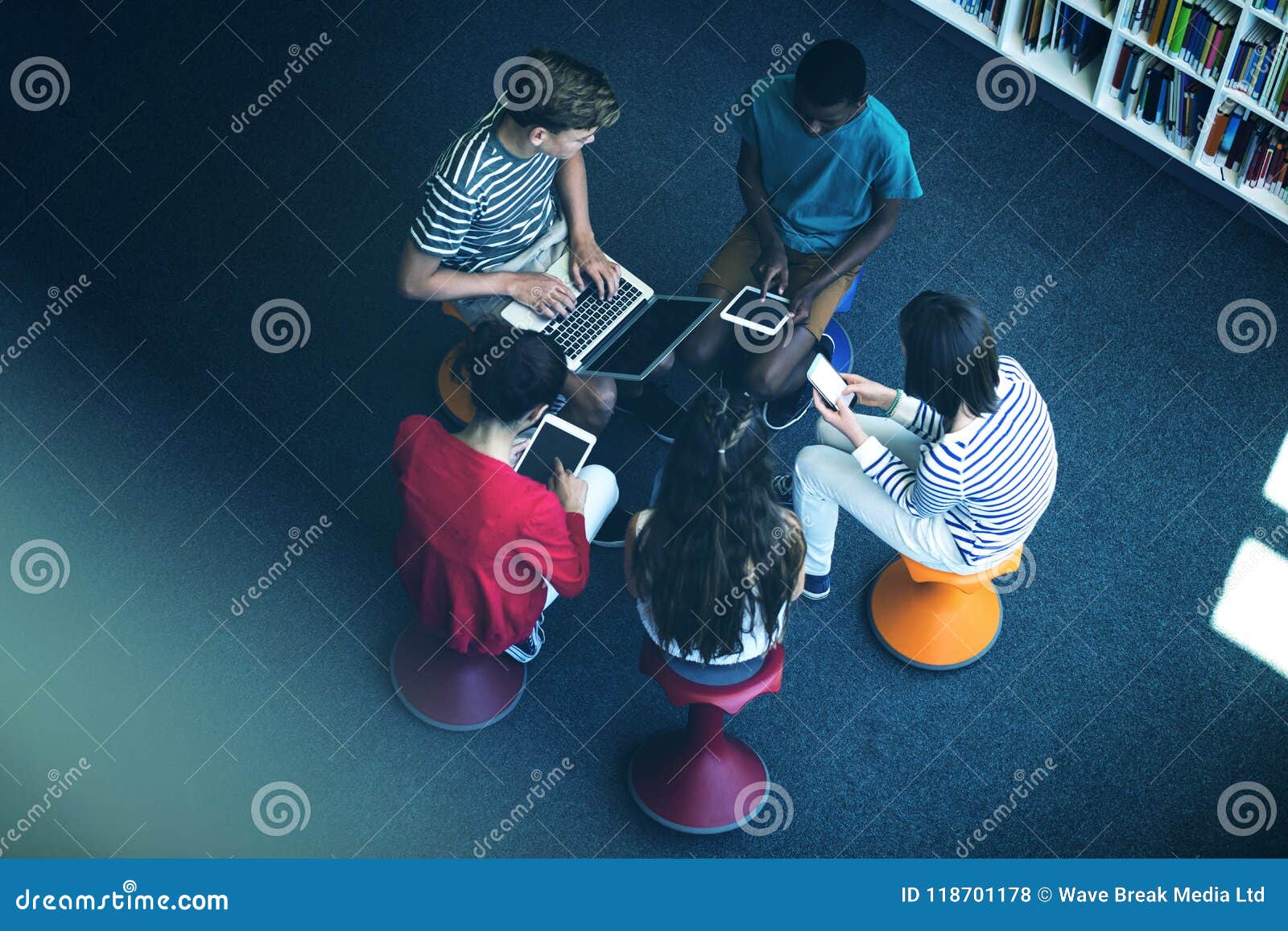 Students Using Laptop, Mobile Phone, Digital Tablet in Library Stock ...