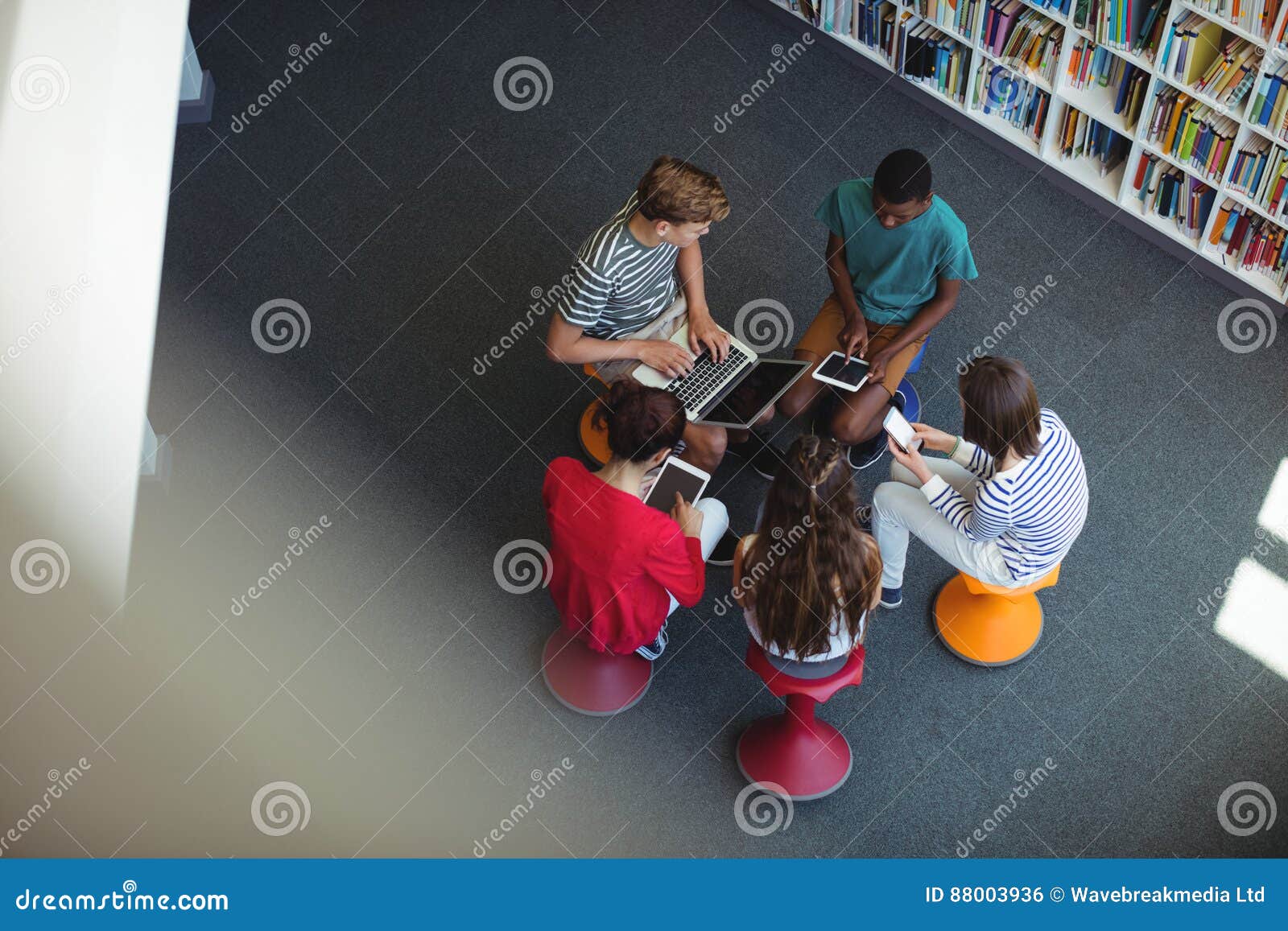 Students Using Laptop, Mobile Phone, Digital Tablet in Library Stock ...