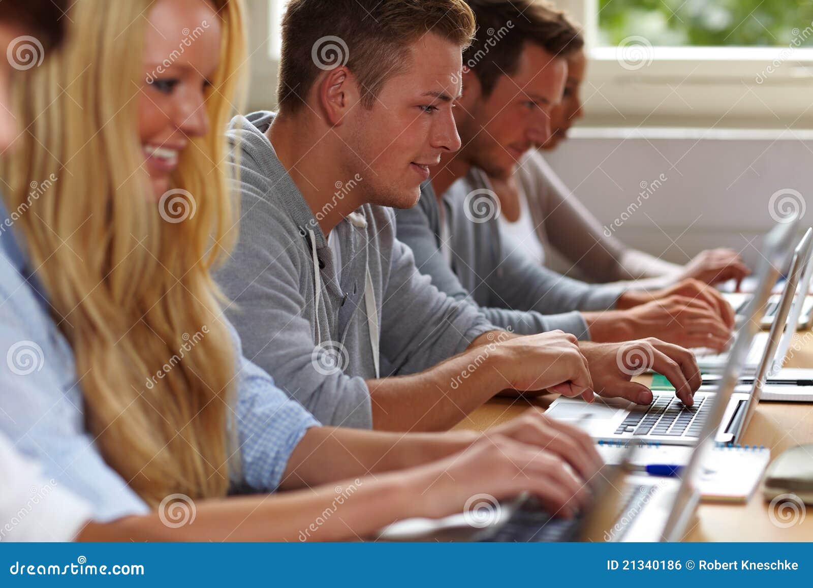 Students Using Laptops in Class Stock Photo - Image of group, distance ...