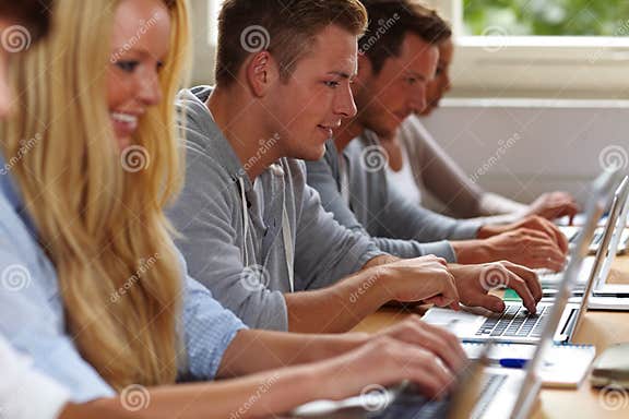 Students Using Laptops in Class Stock Photo - Image of group, distance ...
