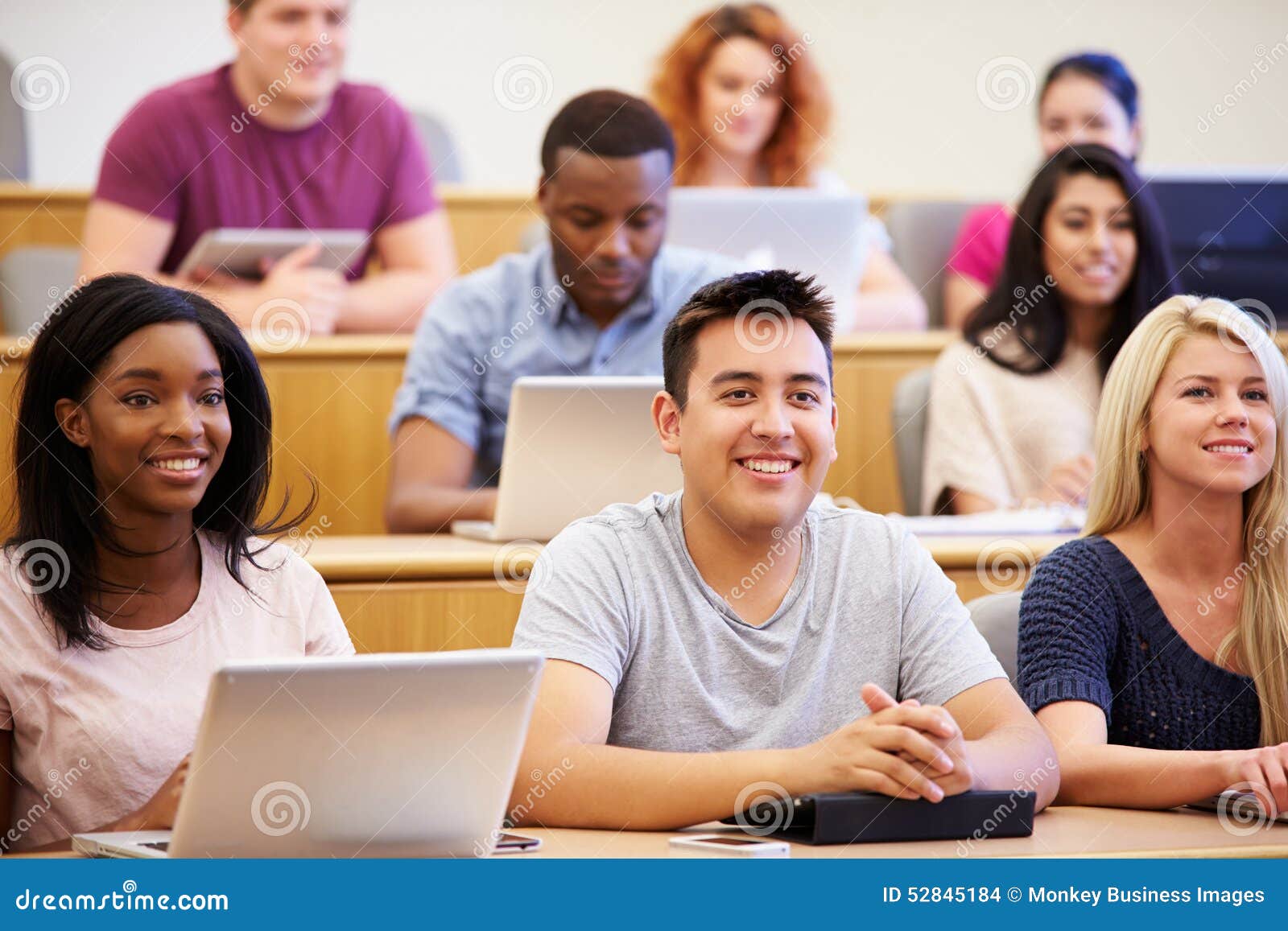 Students Using Laptops and Digital Tablets in Lecture Stock Photo ...