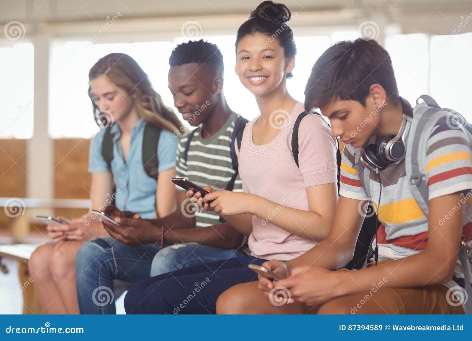 Students Using Mobile Phone in Campus Stock Image - Image of female ...