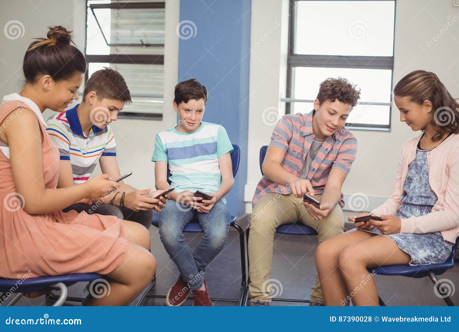 Students Using Mobile Phone in Classroom Stock Photo - Image of ...