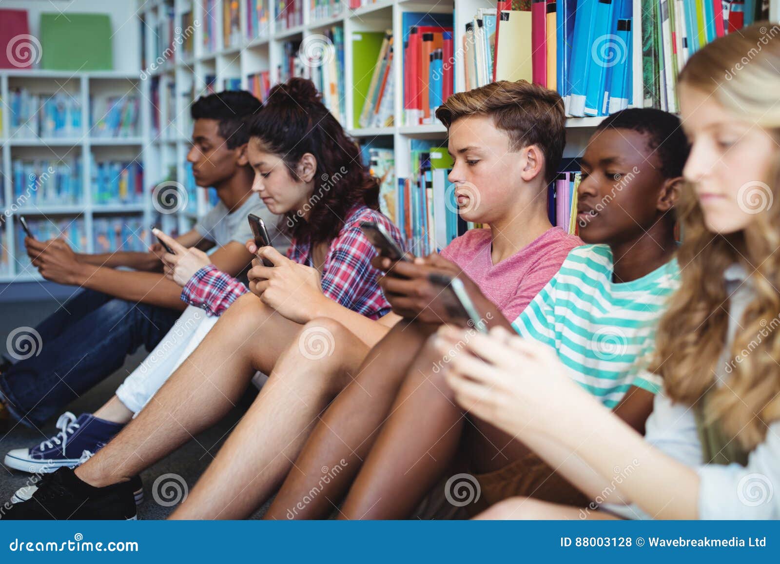 Students Using Mobile Phone in Library Stock Photo - Image of knowledge ...