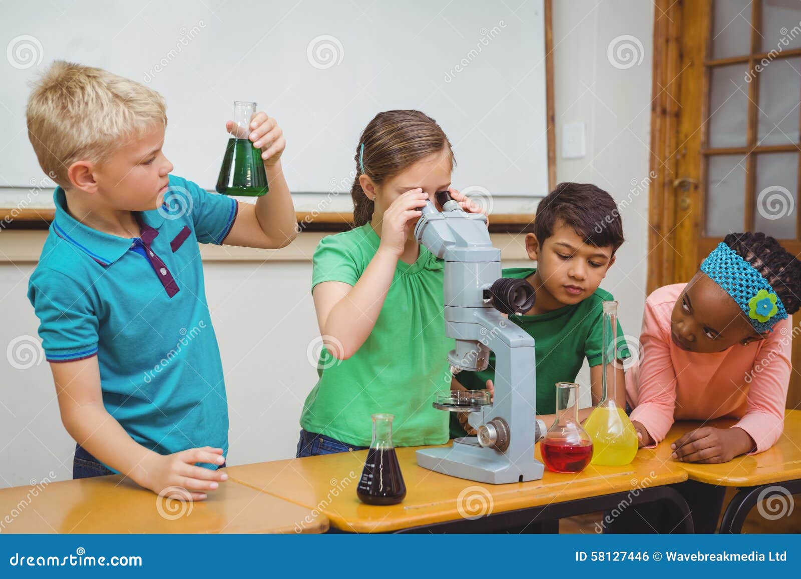 Students Using Science Beakers and a Microscope Stock Photo - Image of ...