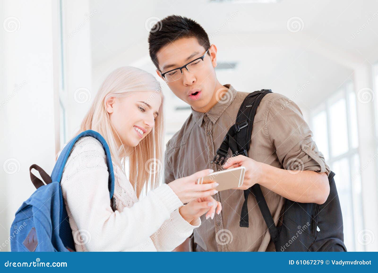 Students Using Smartphone in the University Hall Stock Image - Image of ...