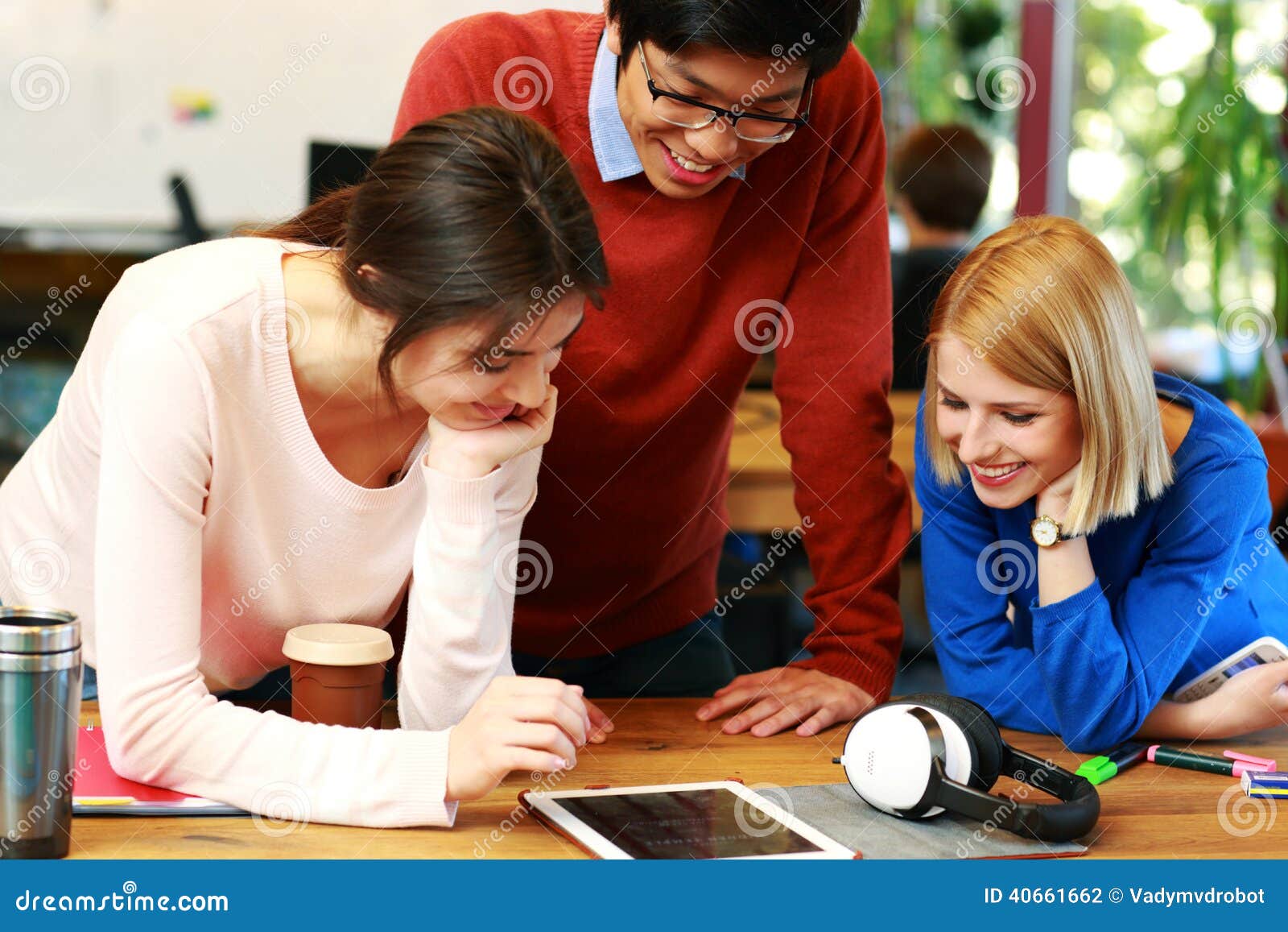 Students Using Tablet Computer Together Stock Photo - Image of happy ...