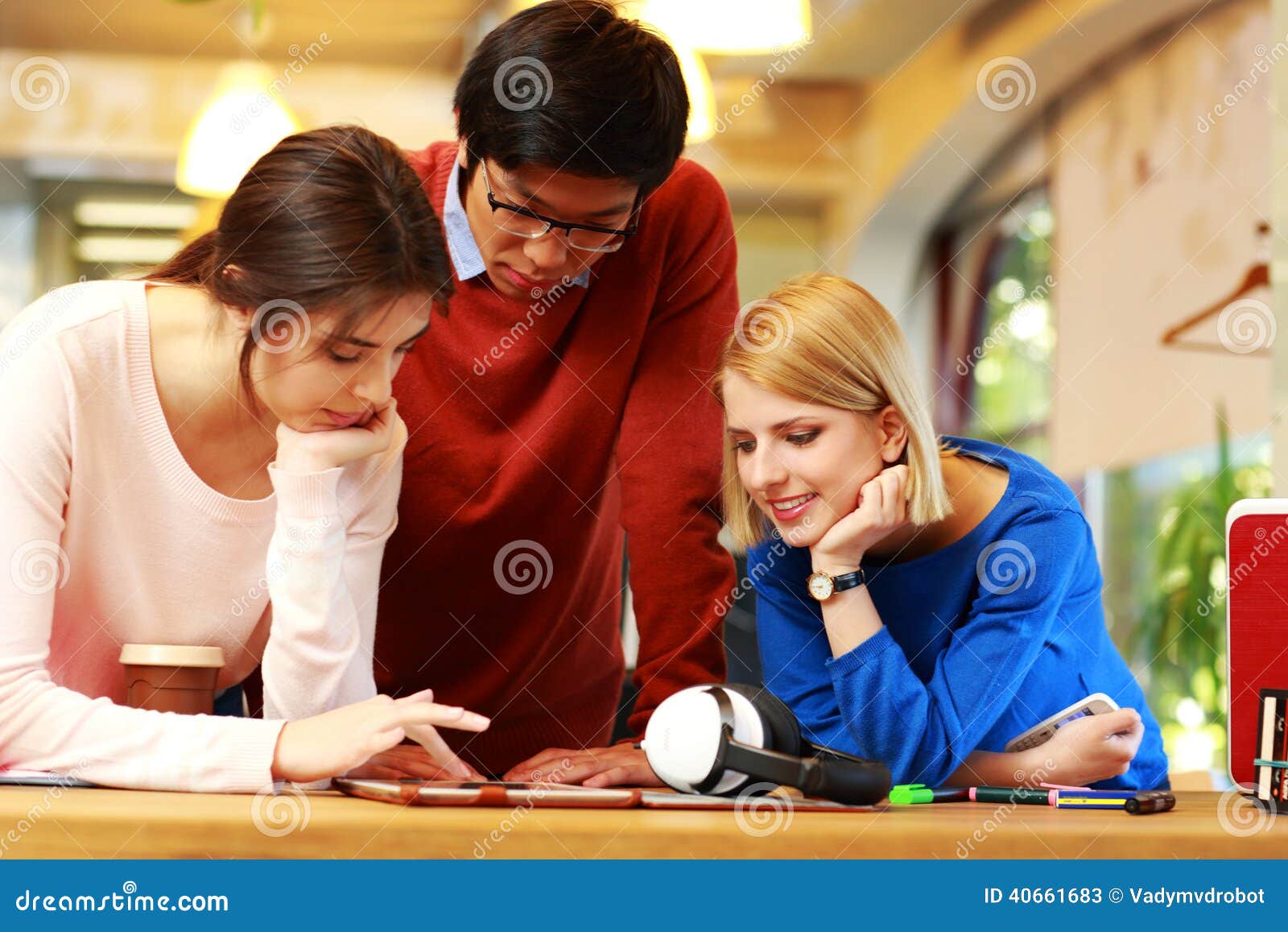 Students Using Tablet Computer Together Stock Image - Image of ...