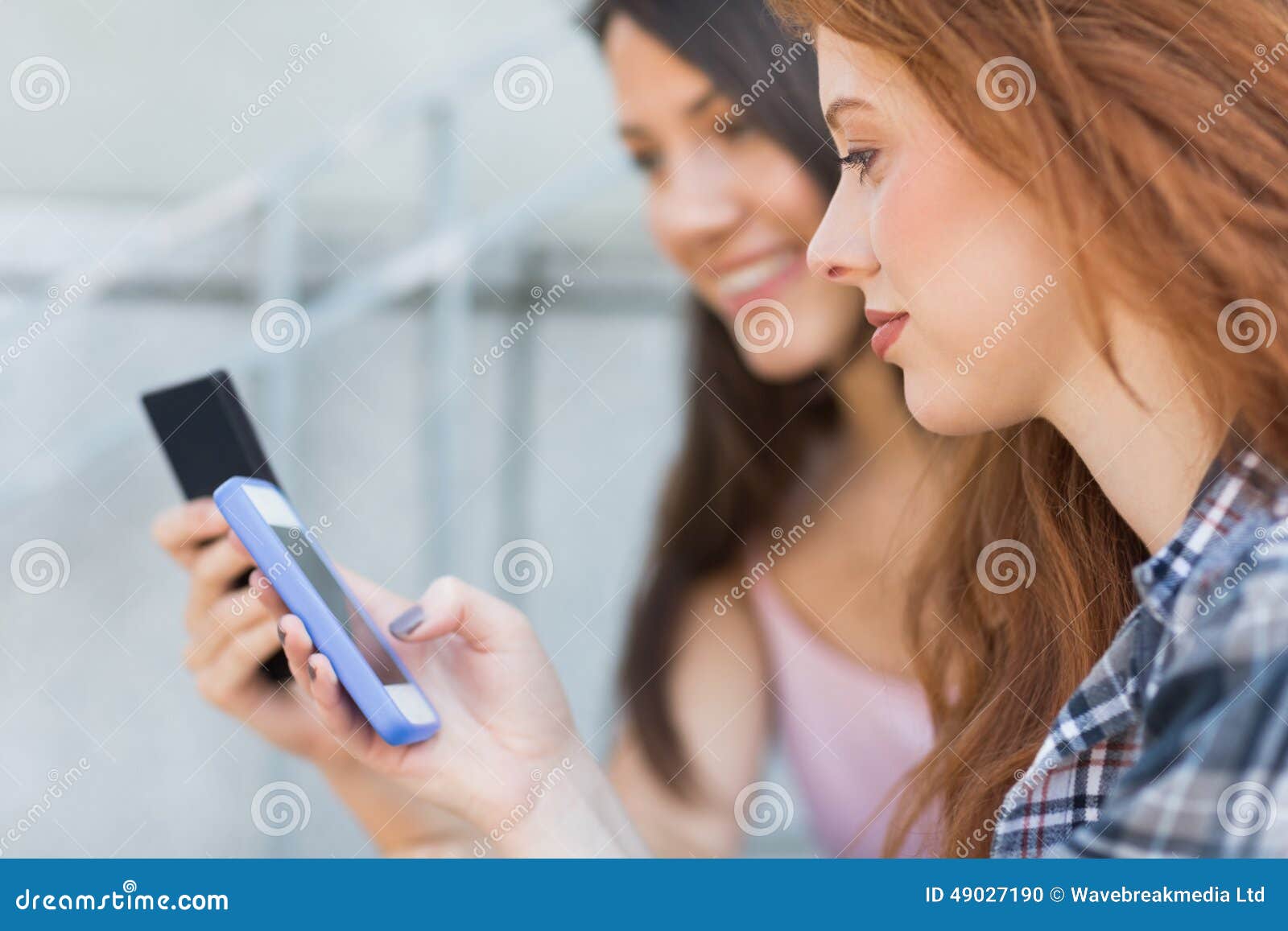Students Using Their Smartphones Together Stock Photo - Image of adult ...