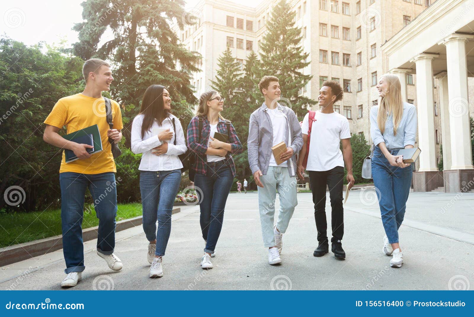 Students Walking Outside the College Building and Talking Stock Photo ...