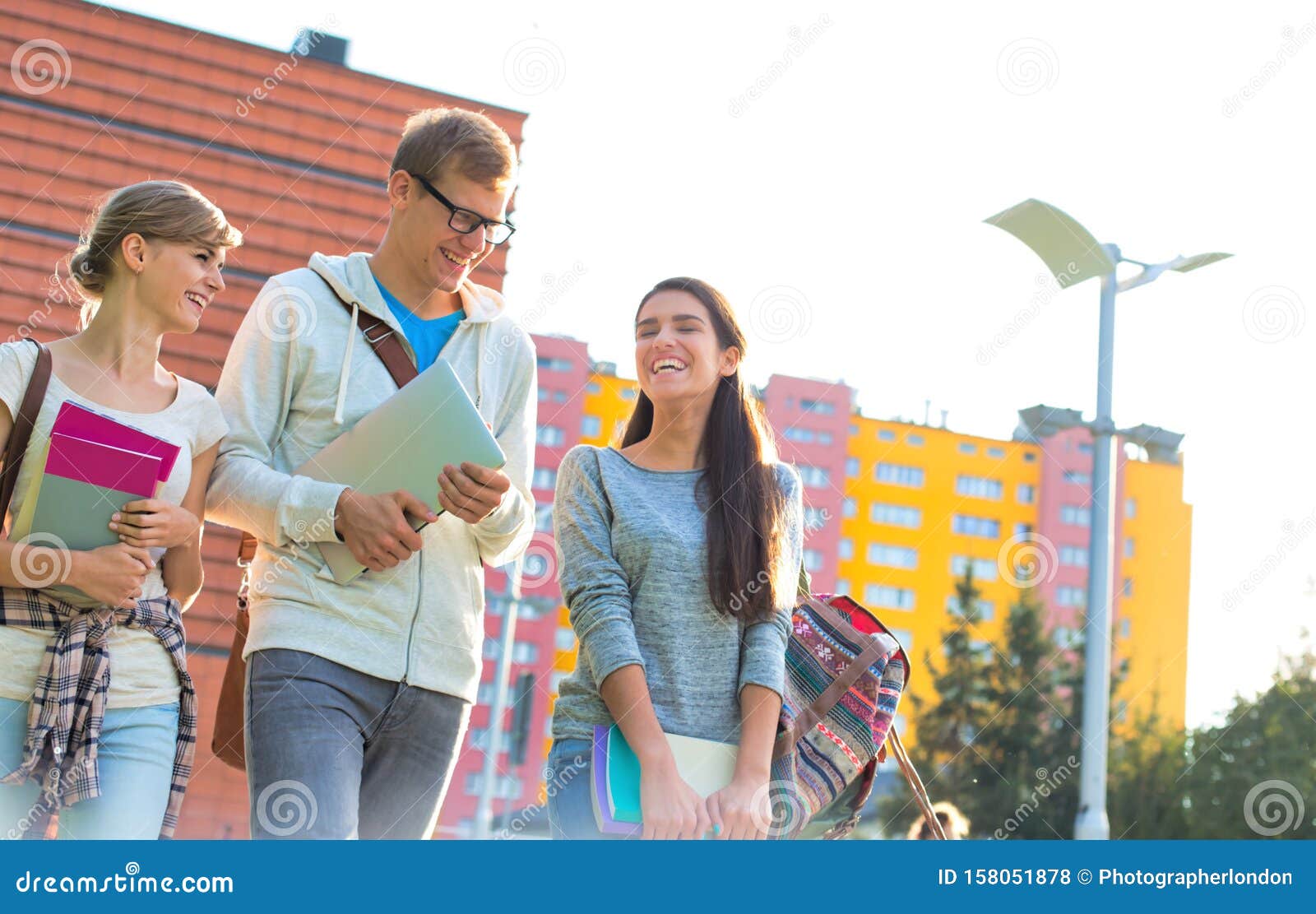 Students Walking Outside University Campus Stock Photo - Image of ...