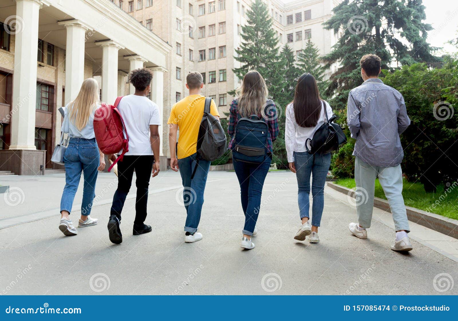 Students Walking Together Outdoors after Studies in Campus Stock Photo ...
