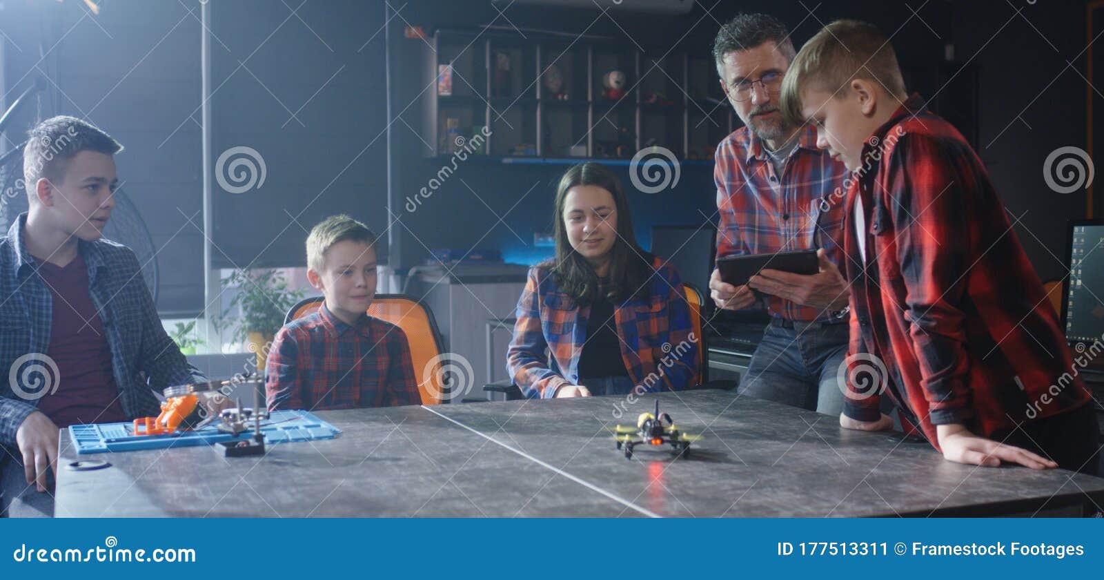 Students Watching Flying Drone in Class Stock Image - Image of indoors ...