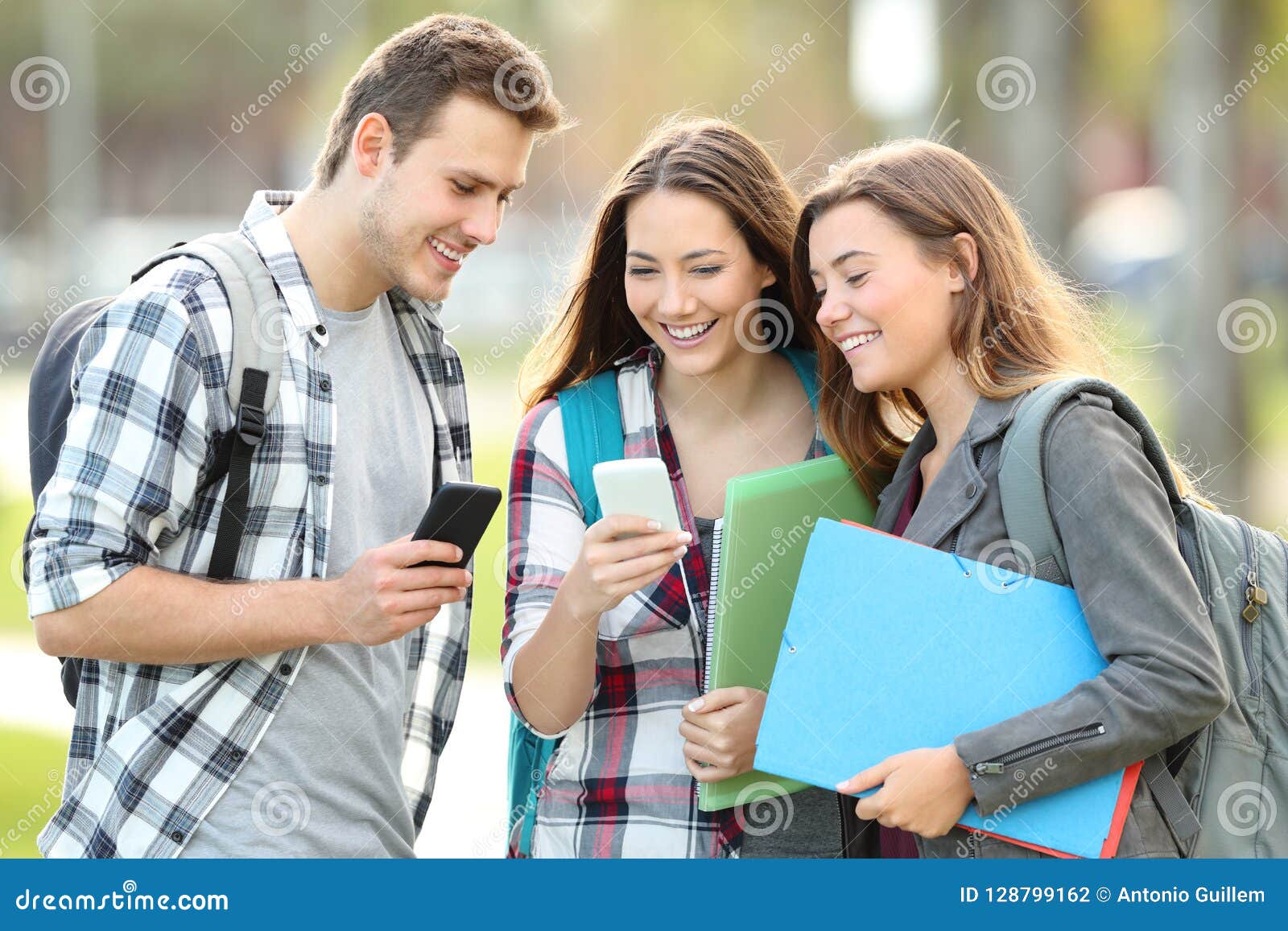 Students Watching Media in Their Smart Phones Stock Photo - Image of ...