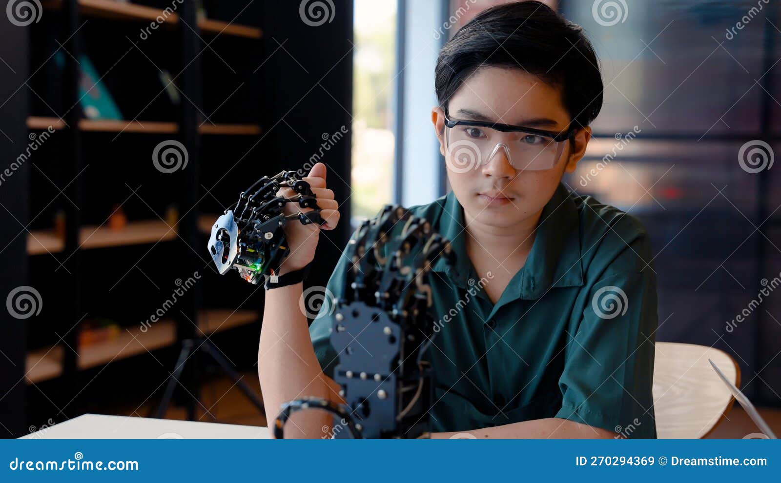 Students Wearing Wireless Controllers Move Their Robotic Hands. Move ...