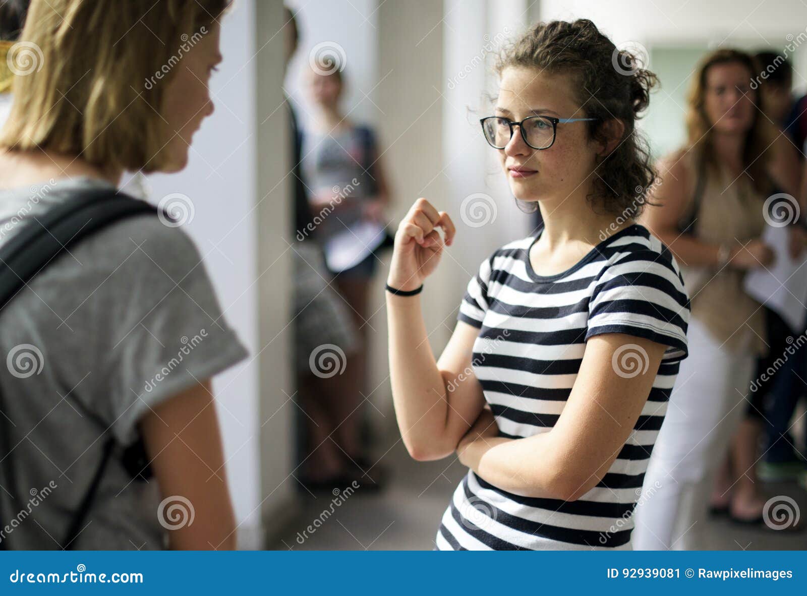 Students Women Standing Talking on Break Stock Image - Image of ...