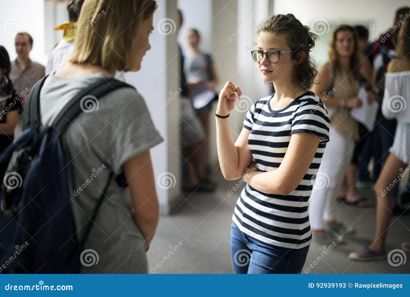 Students Women Standing Talking on Break Stock Image - Image of girls ...