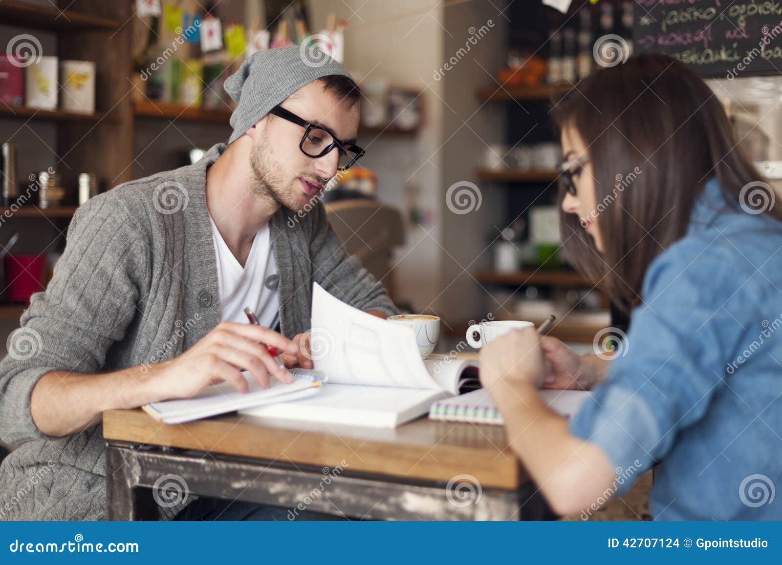 Students working at cafe stock photo. Image of coffee - 42707124
