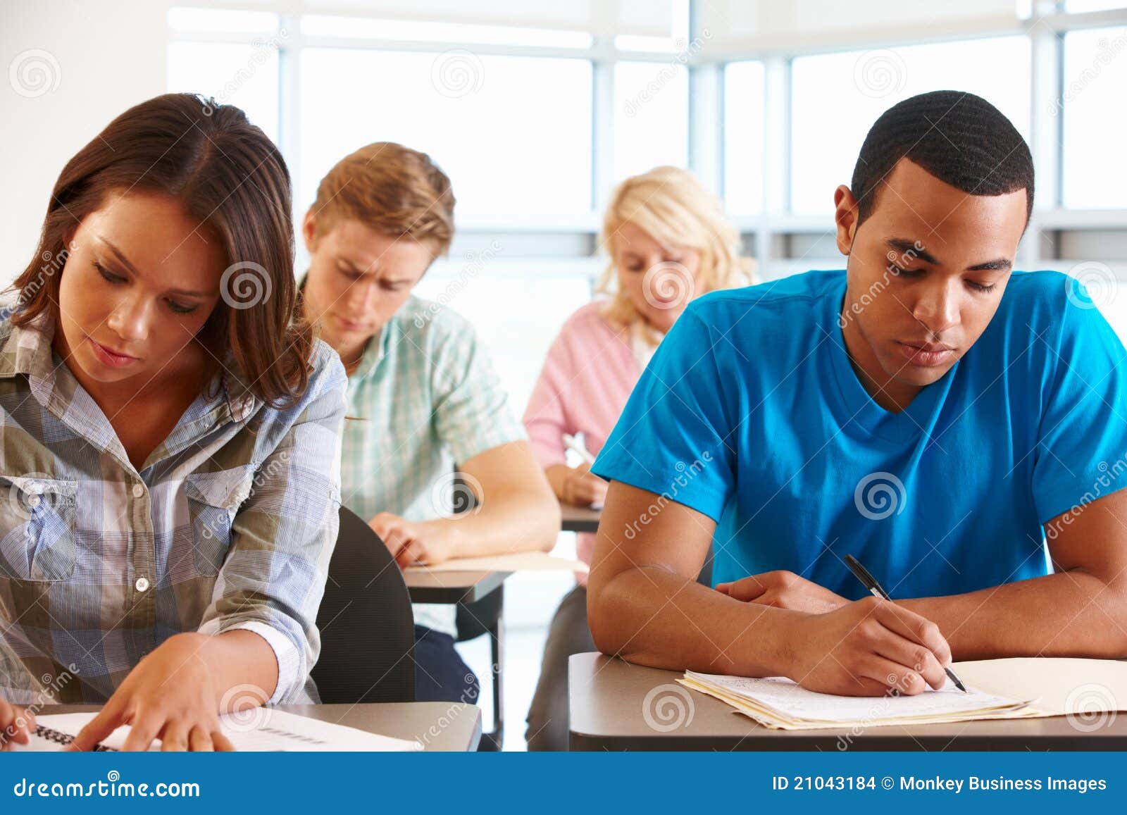 Students Working In Classroom Stock Images - Image: 21043184