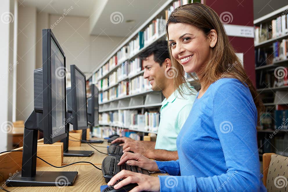 Students Working on Computers in Library Stock Photo - Image of ...
