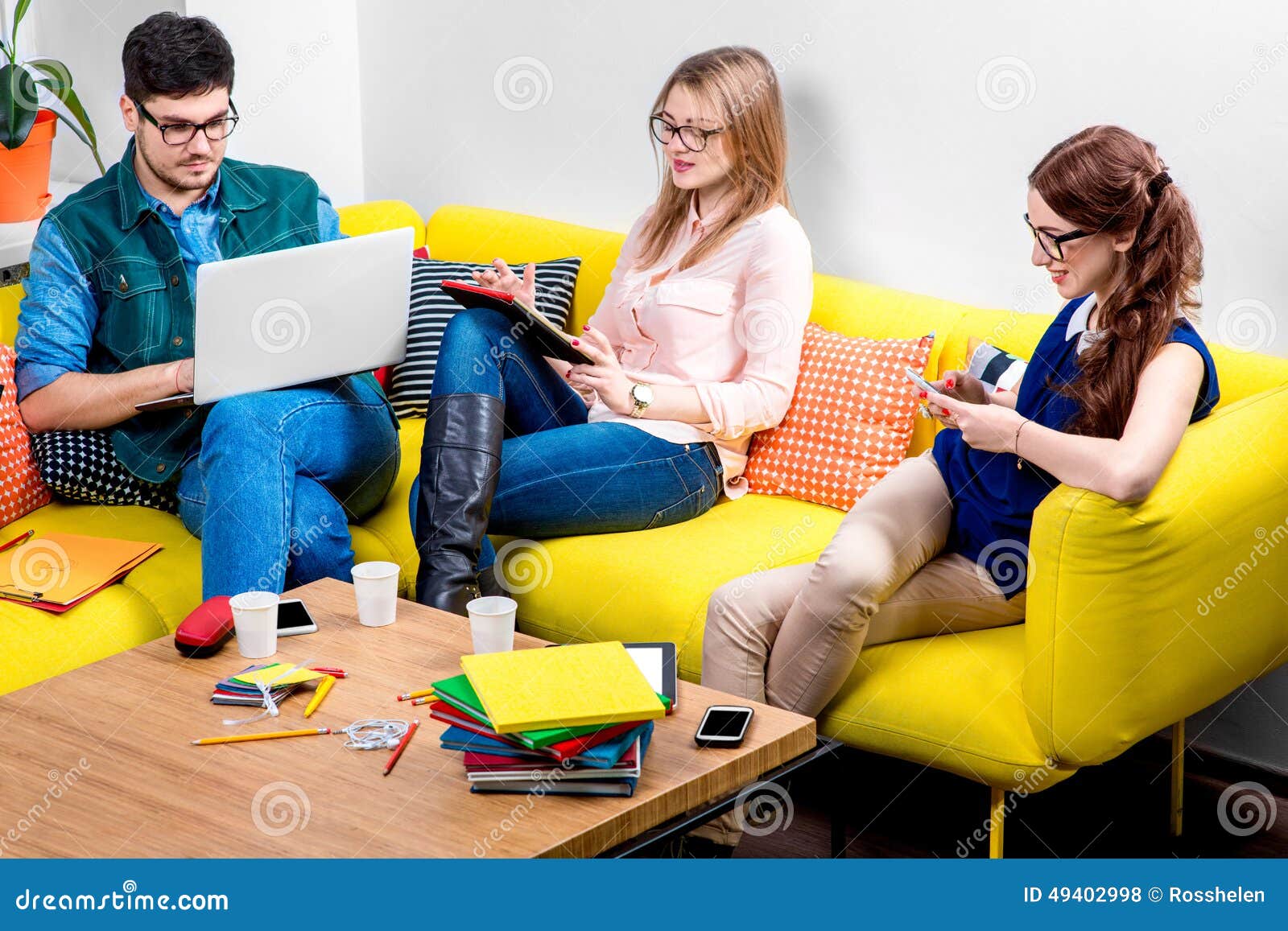 Students Working on the Couch Stock Photo - Image of chummery, learning ...