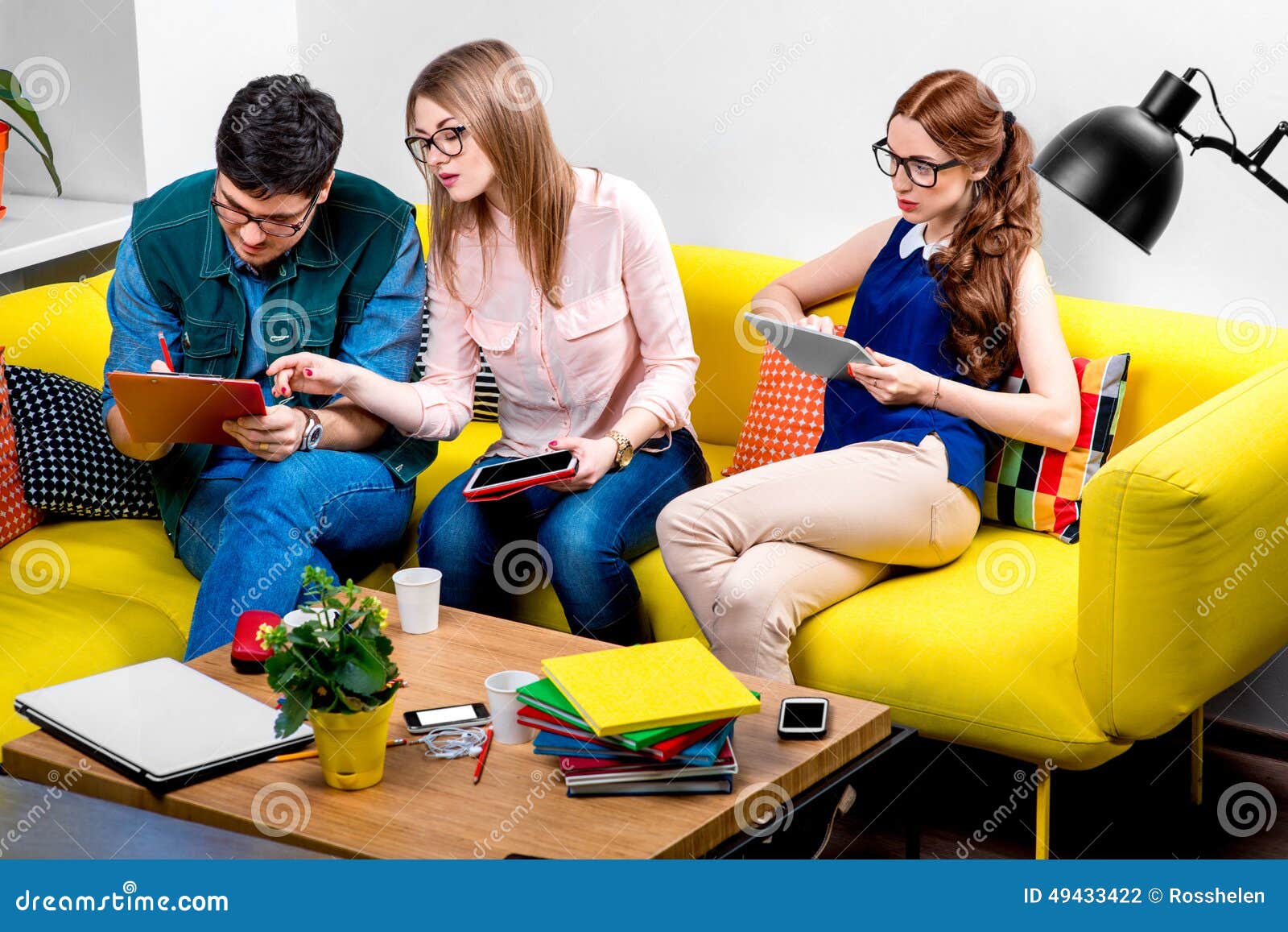 Students Working on the Couch Stock Photo - Image of people, caucasian ...