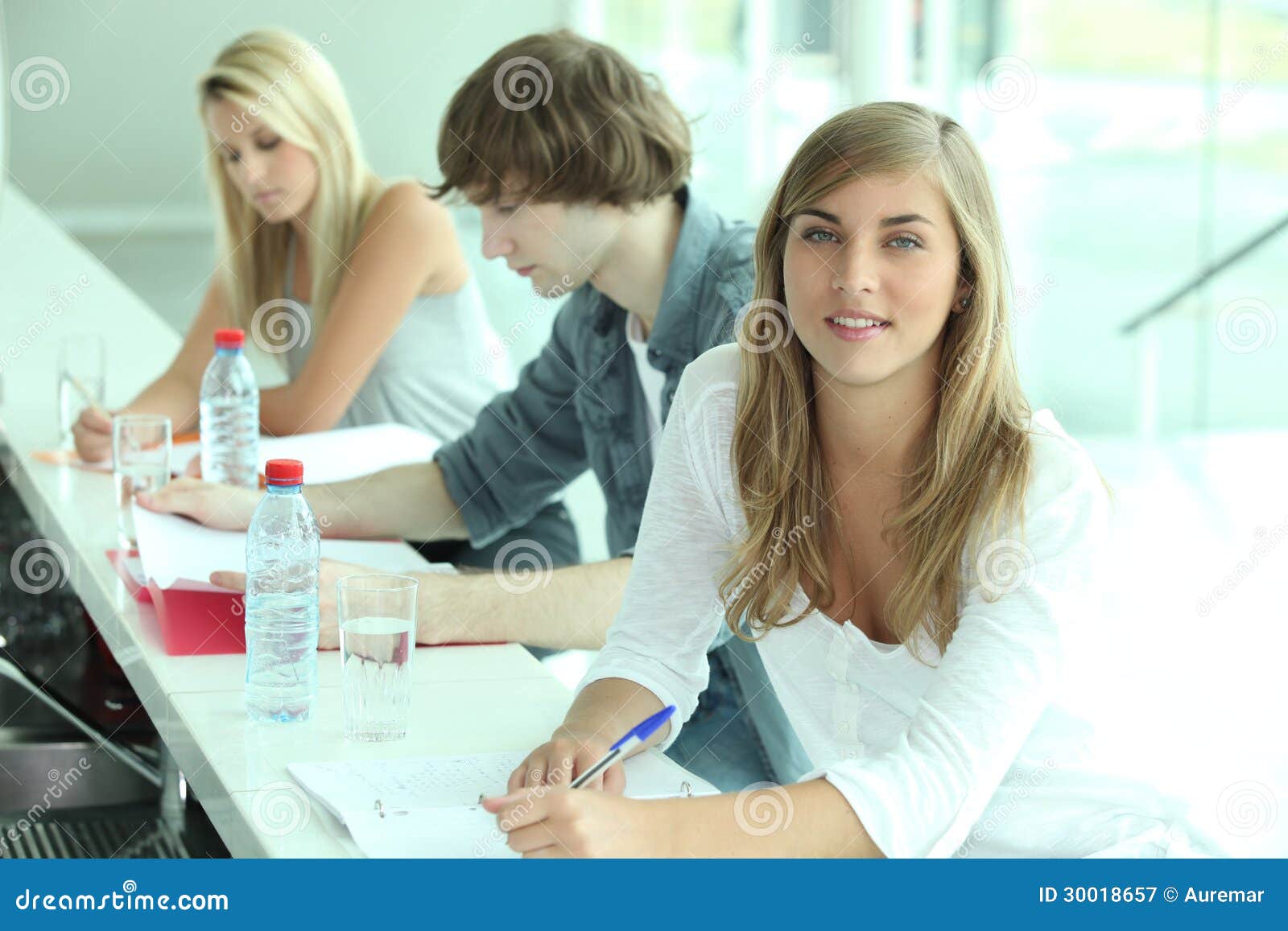 Students Working on a Project Stock Image - Image of bottle, desk: 30018657