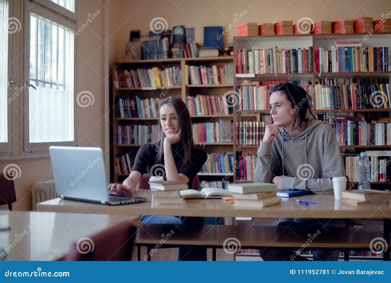 Students Working on Laptop in Library. Stock Image - Image of couple ...