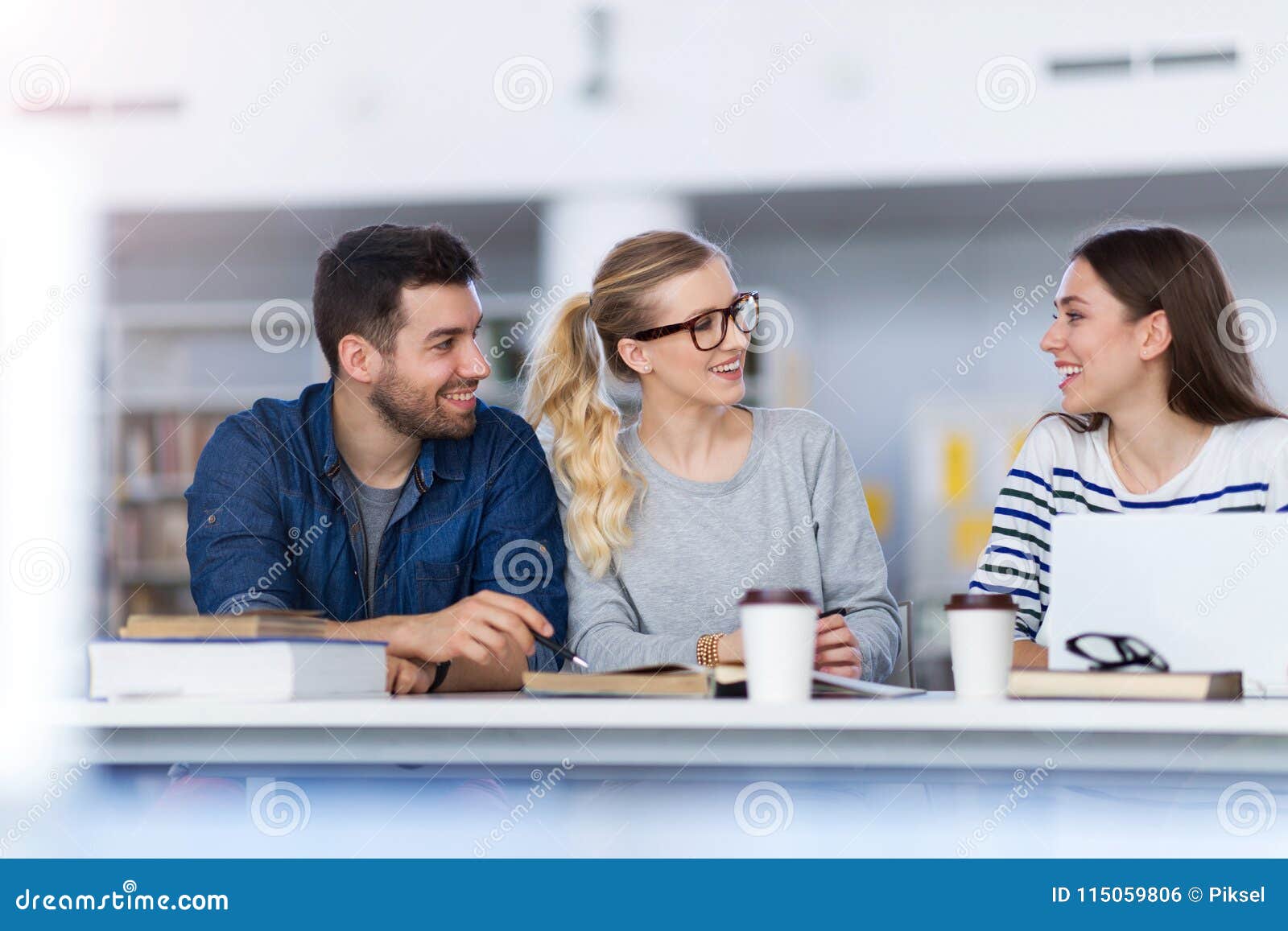 Students Working in the Library at Campus Stock Photo - Image of casual ...