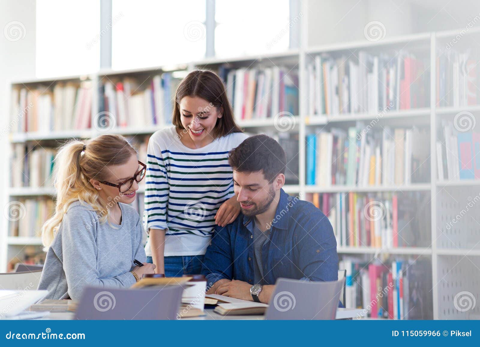 Students Working in the Library at Campus Stock Photo - Image of campus ...