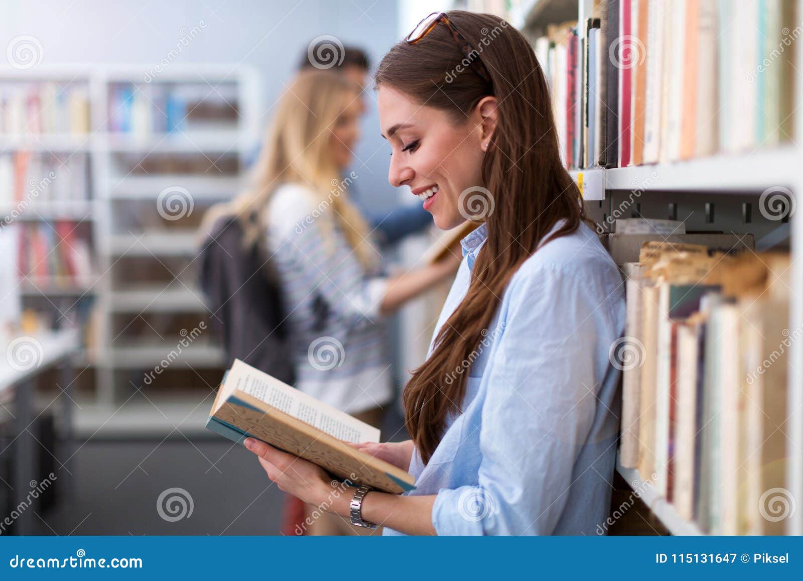 Students Working in the Library at Campus Stock Image - Image of ...