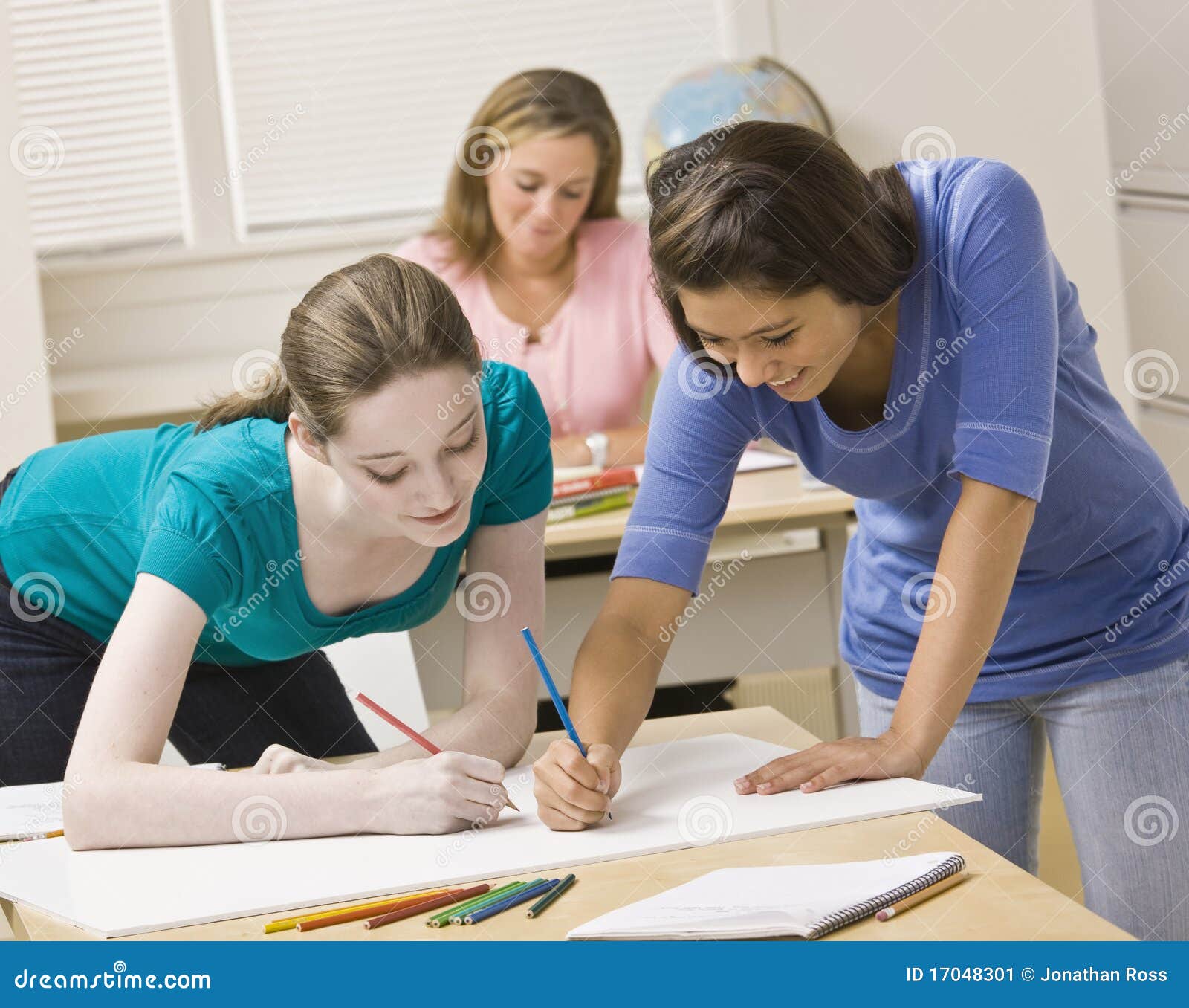 Students Working on Project in Classroom Stock Image - Image of solemn ...