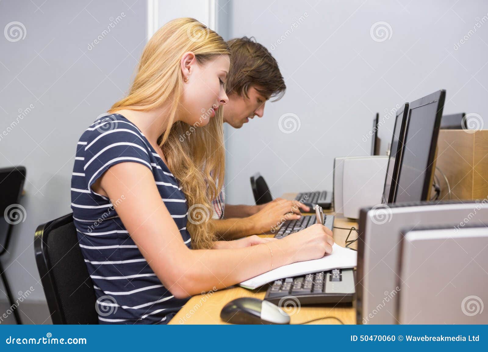 Students Working Together on Computer Stock Photo - Image of people ...