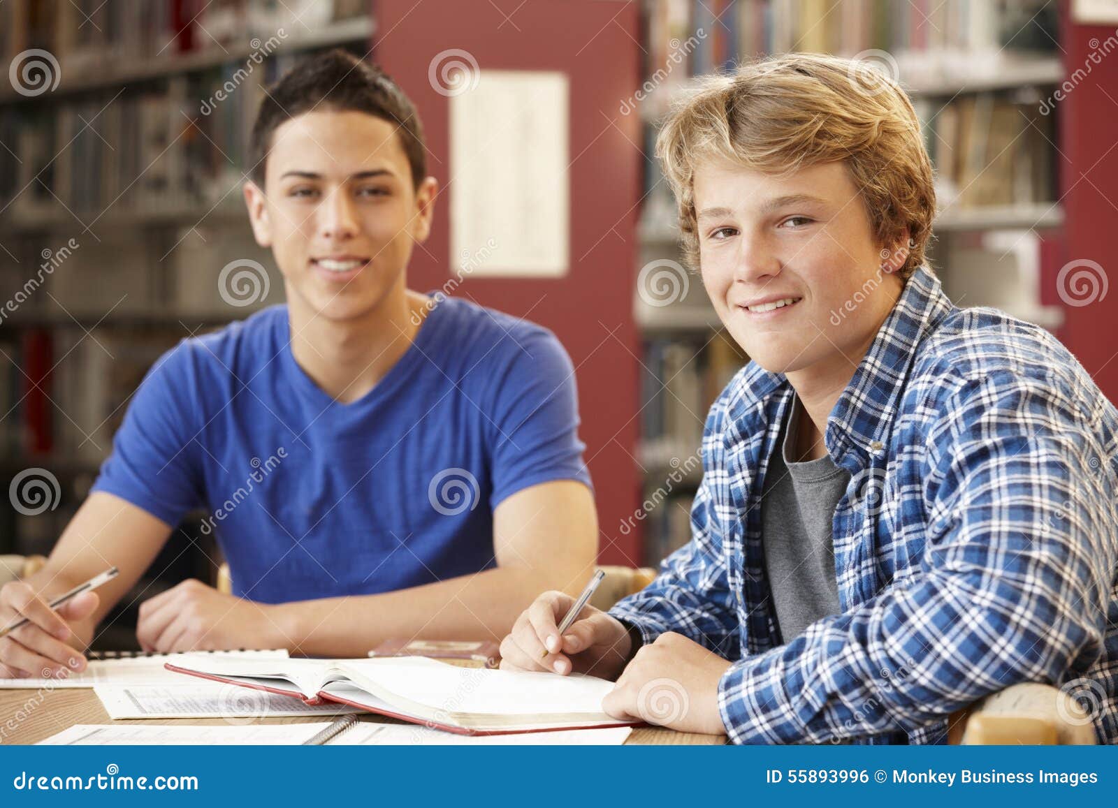 2 Students Working Together in Library Stock Photo - Image of caucasian ...
