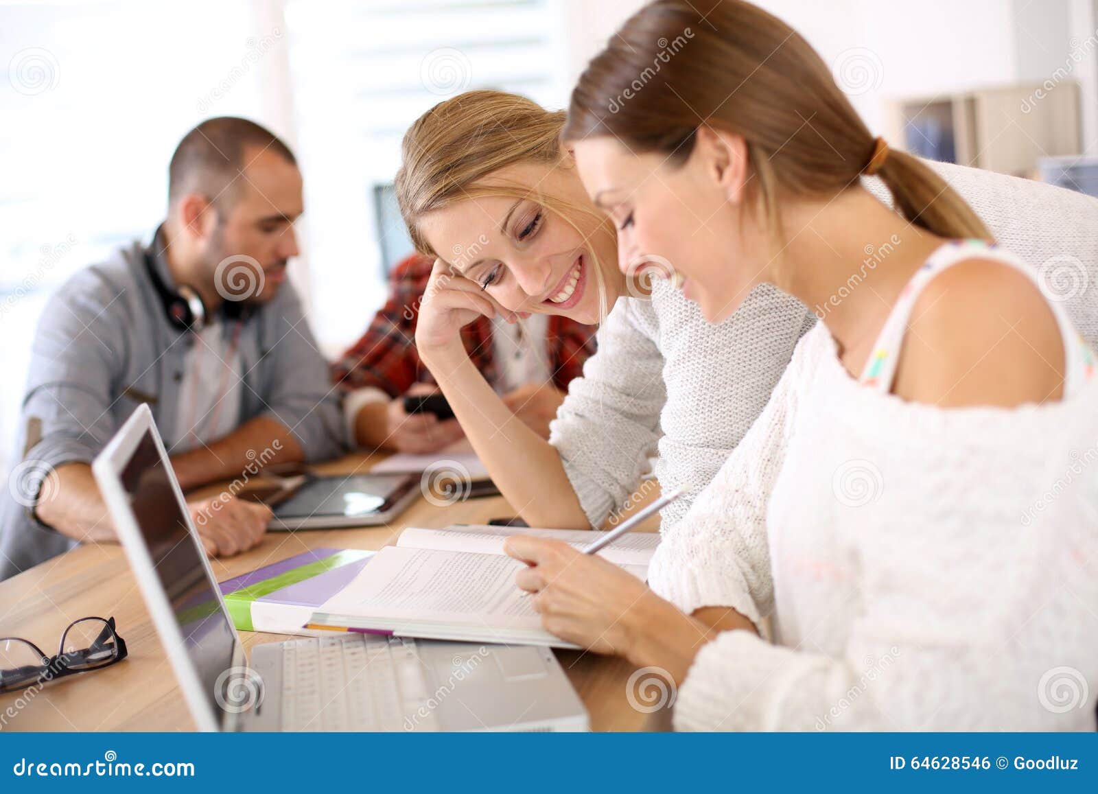Students working together stock photo. Image of girls - 64628546