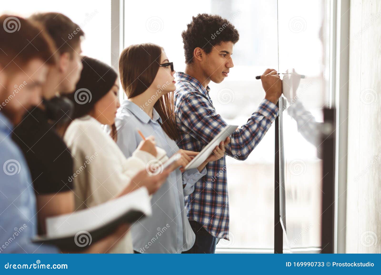 Students Writing Algebra Equations on Whiteboard in Classroom Stock ...