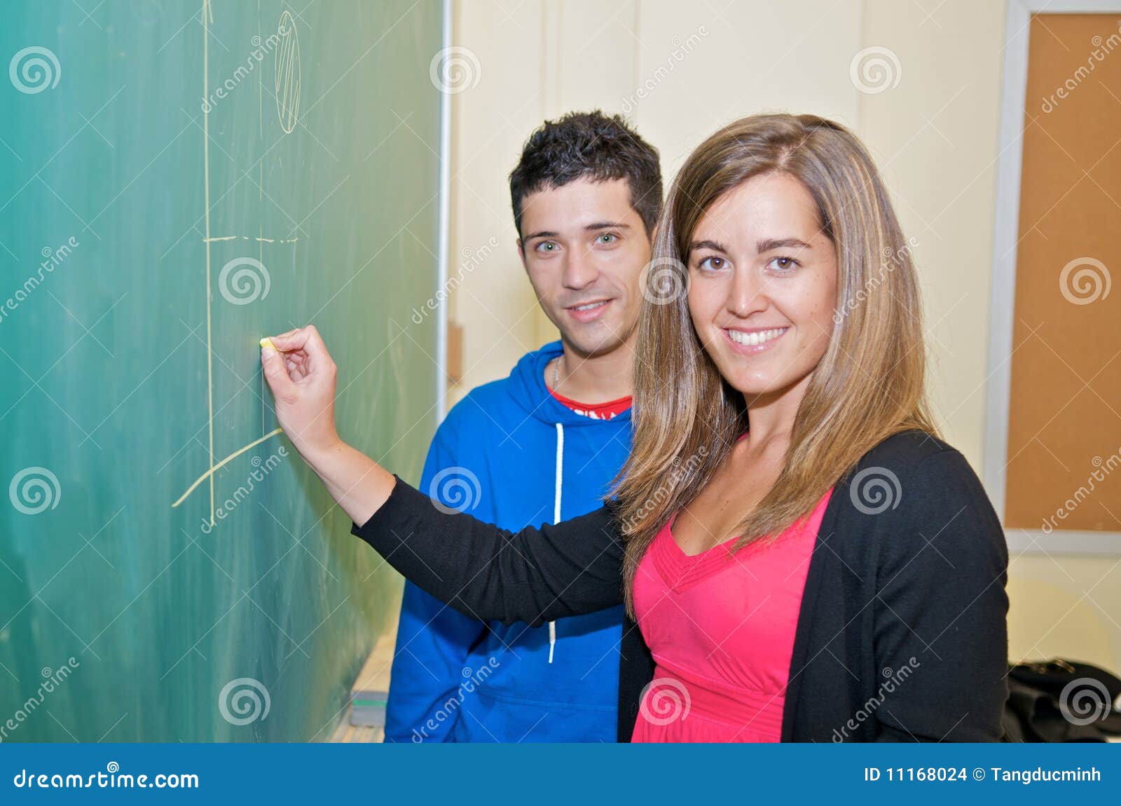 Students Writing on Blackboard Stock Photo - Image of ethnic, students ...
