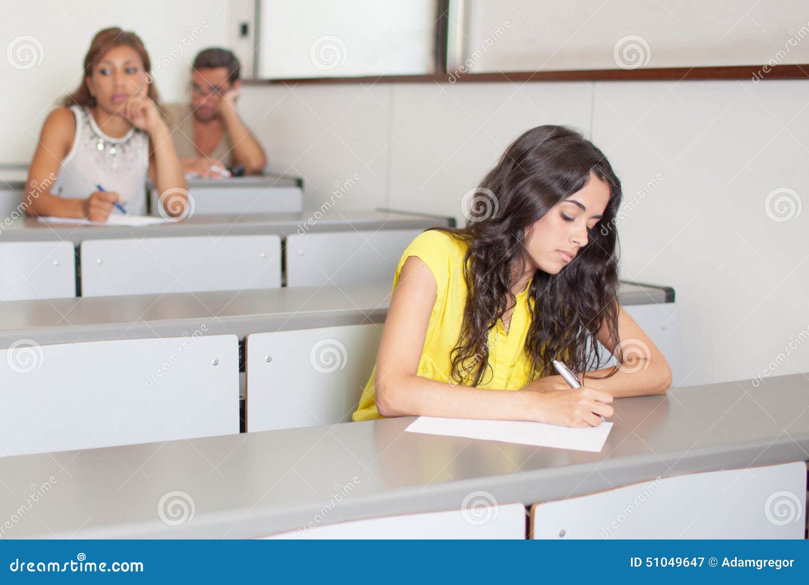 Students writing exam stock image. Image of white, summer - 51049647