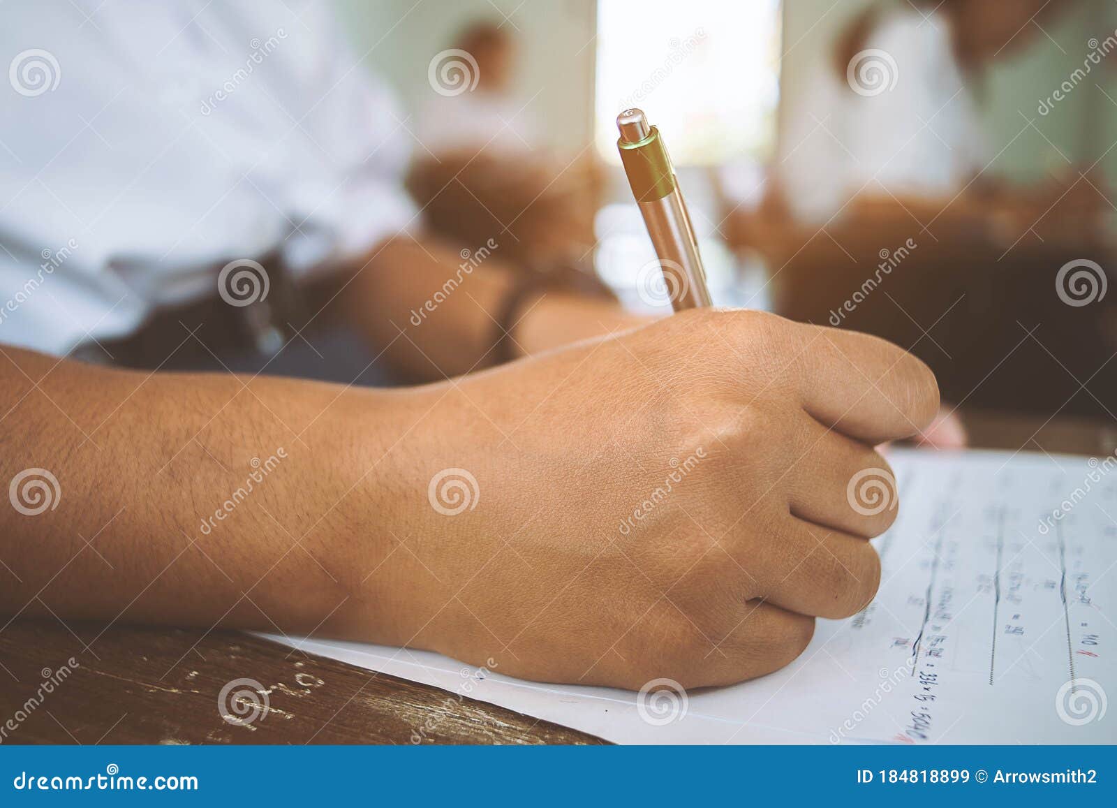 Students Writing Pen in Hand Doing Exams Answer Sheets Exercises in ...