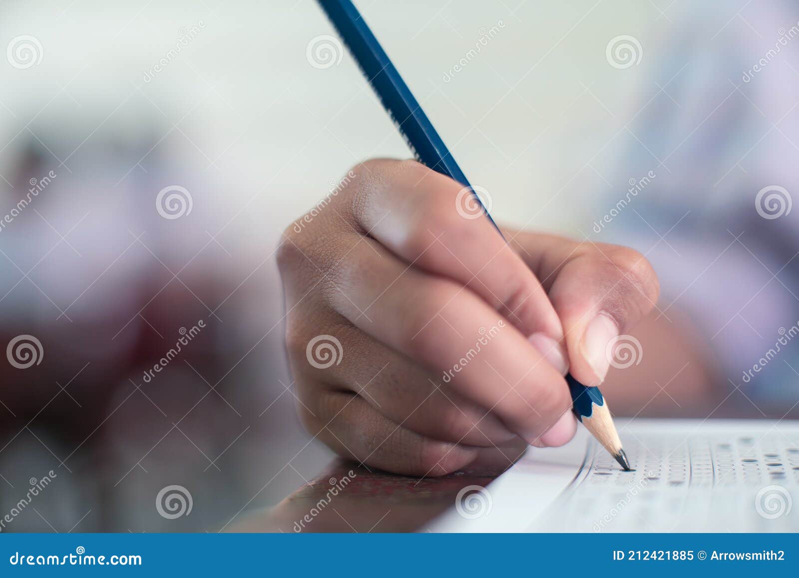 Students Writing Pen in Hand Doing Exams Answer Sheets Exercises in ...